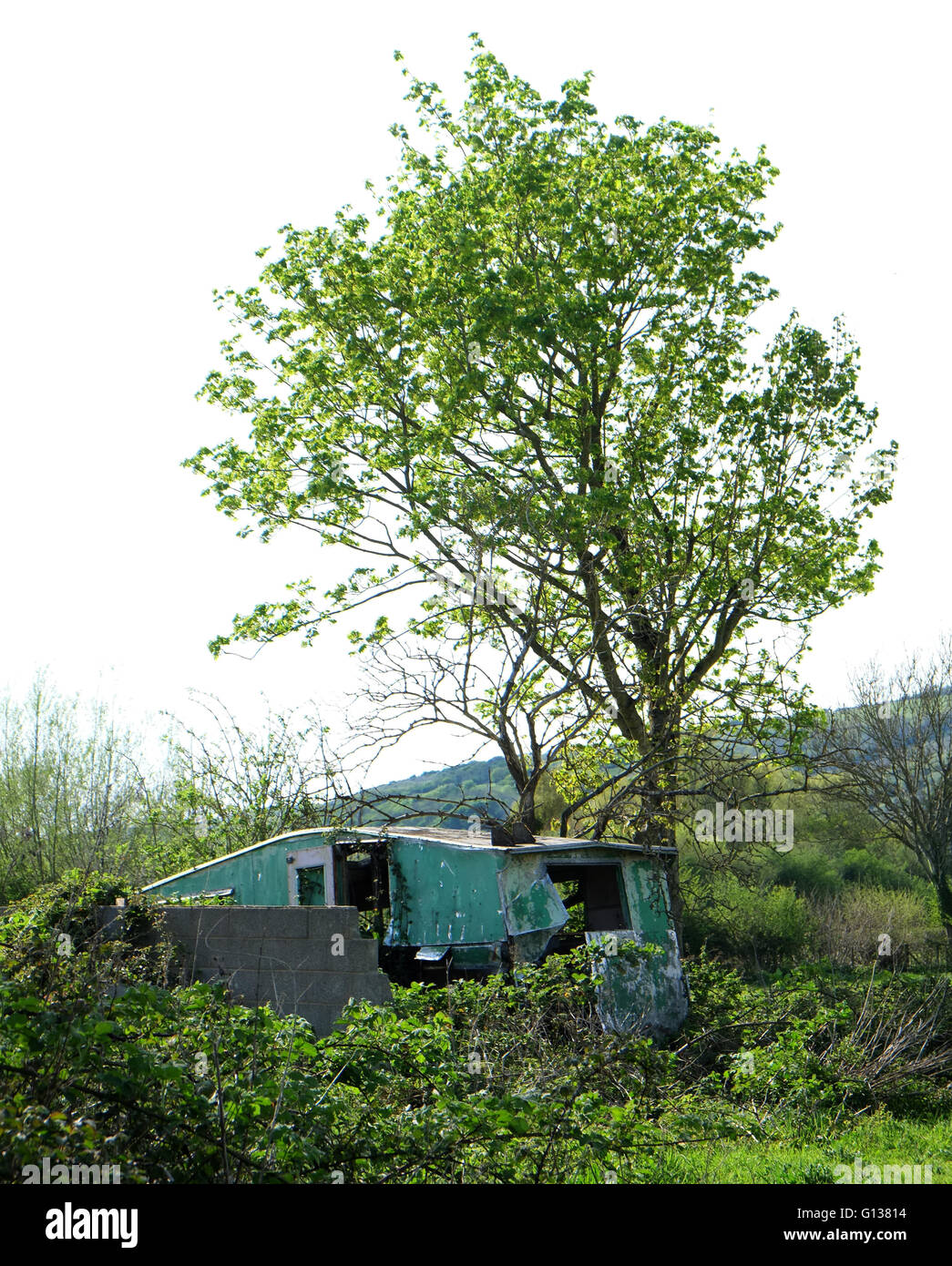 Old dilapidated touring caravan rotting in the corner of a field. 8th ...