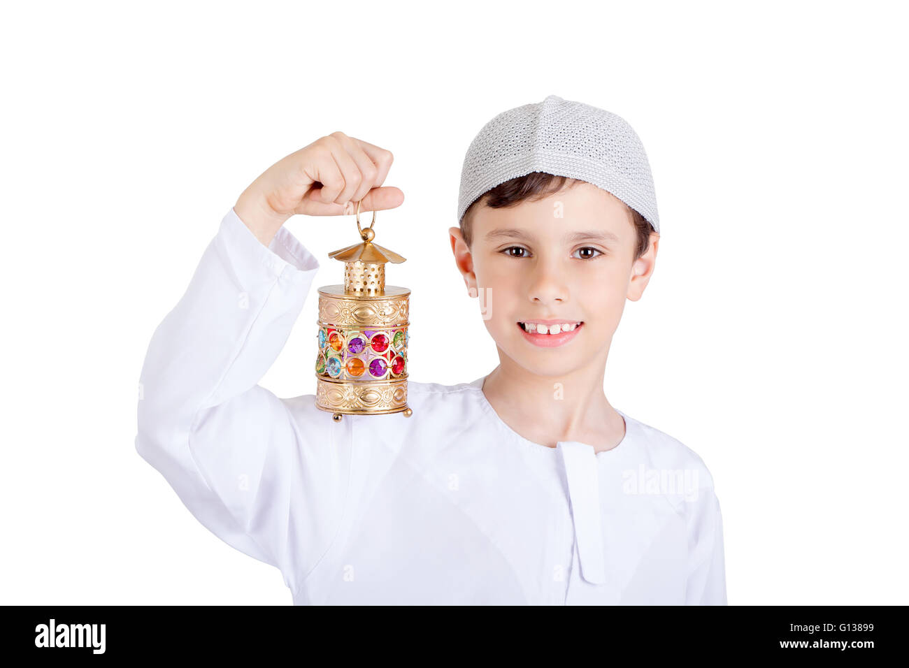 Happy Ramadan - Young Muslim kis smiling and holding Ramadan lantern ...