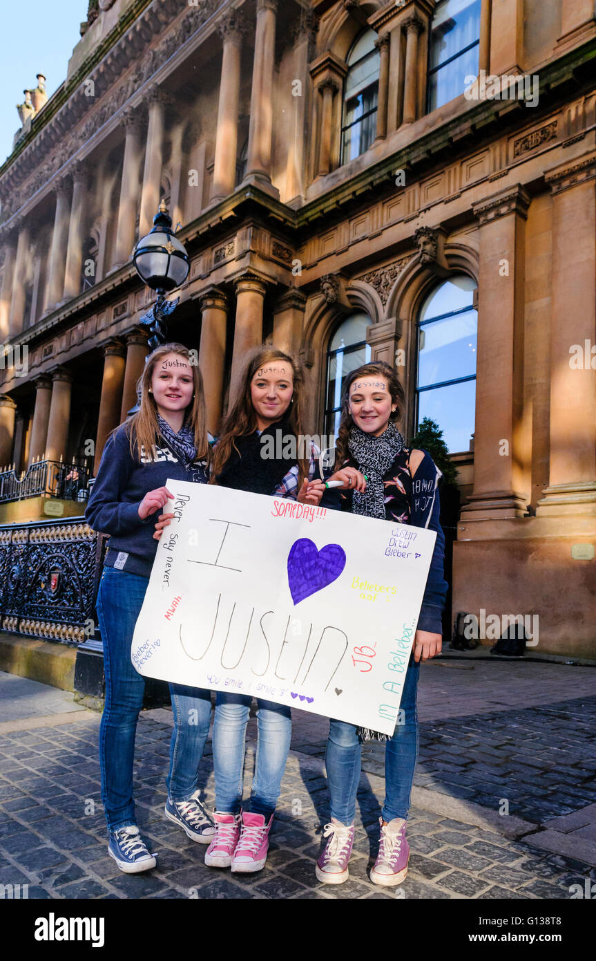 Teenage girl fans wait to try to catch a glimpse of Canadian pop singer ...