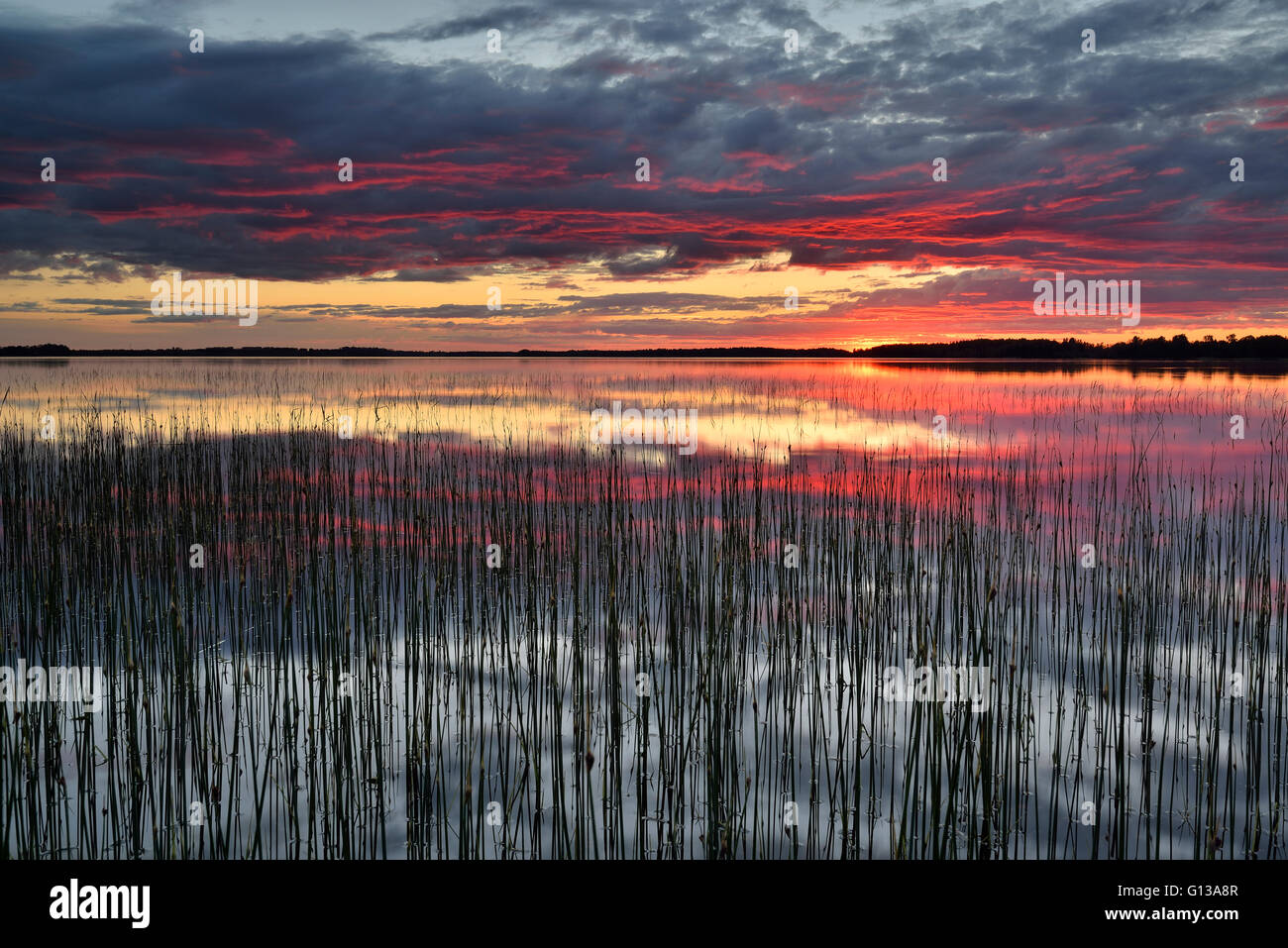 Sunset at the lake Stock Photo - Alamy