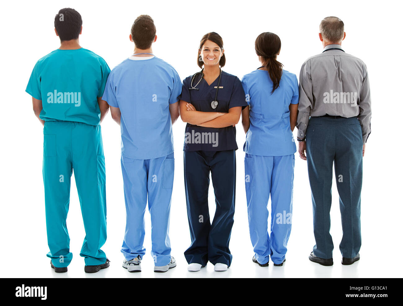 Multi-ethnic group of doctors, physicians, and nurses, both male and ...