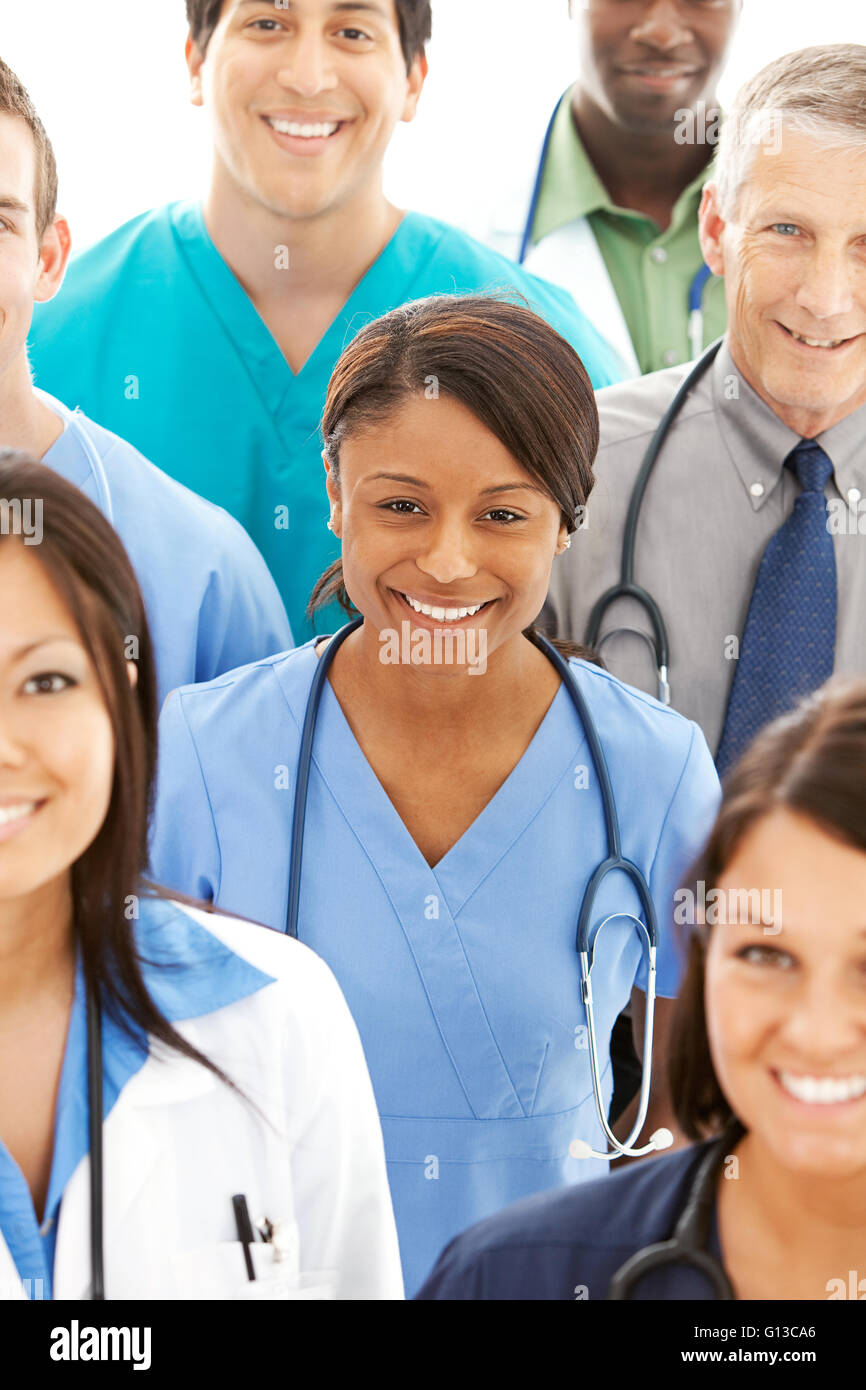 Multi-ethnic group of doctors, physicians, and nurses, both male and ...