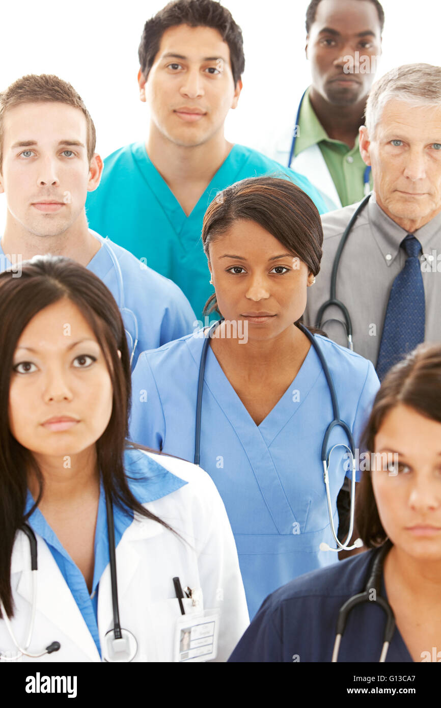 Multi-ethnic group of doctors, physicians, and nurses, both male and ...