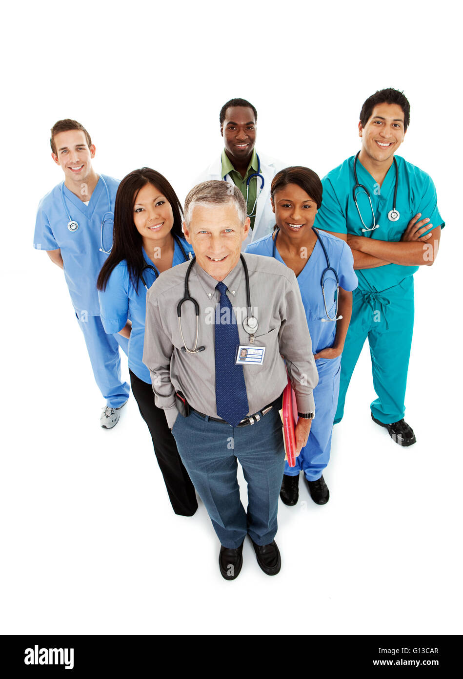 Multi-ethnic group of doctors, physicians, and nurses, both male and ...