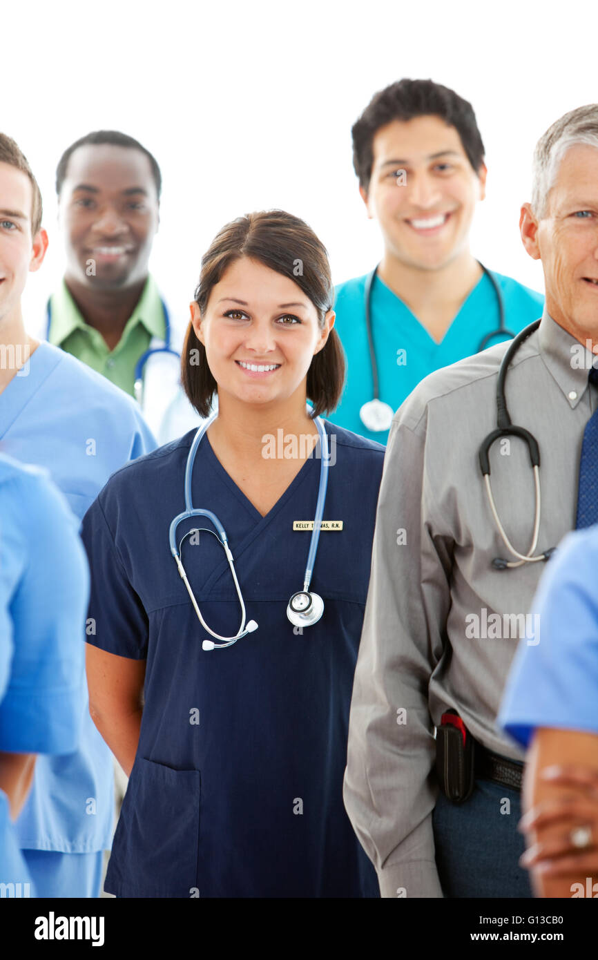 Multi-ethnic group of doctors, physicians, and nurses, both male and ...