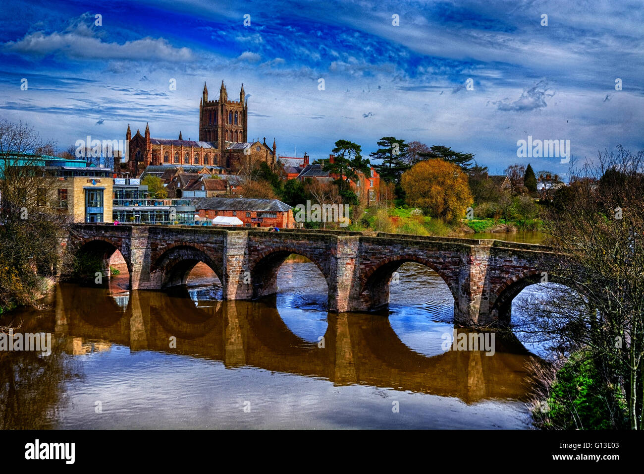 Hereford Cathedral towers over the River Wye and the picturesque Wye ...