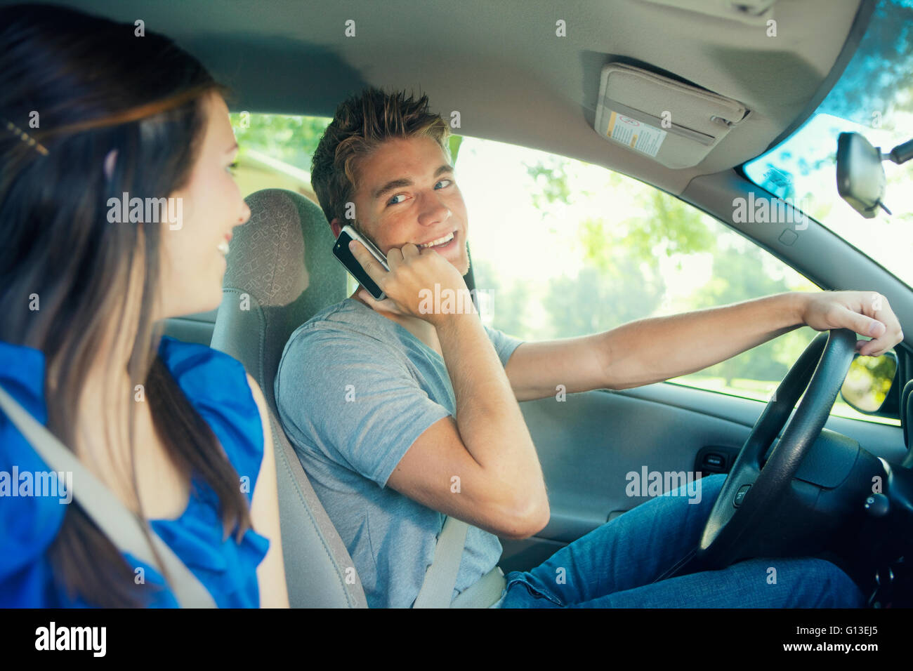 Teens driving texting hi-res stock photography and images - Alamy