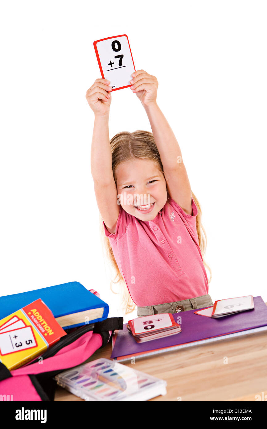 Little girl with school supplies, doing homework, etc Stock Photo - Alamy