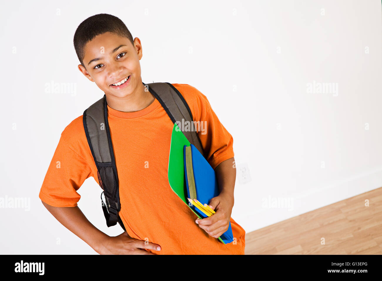 Series of African American boy and girl students, wearing backpacks ...