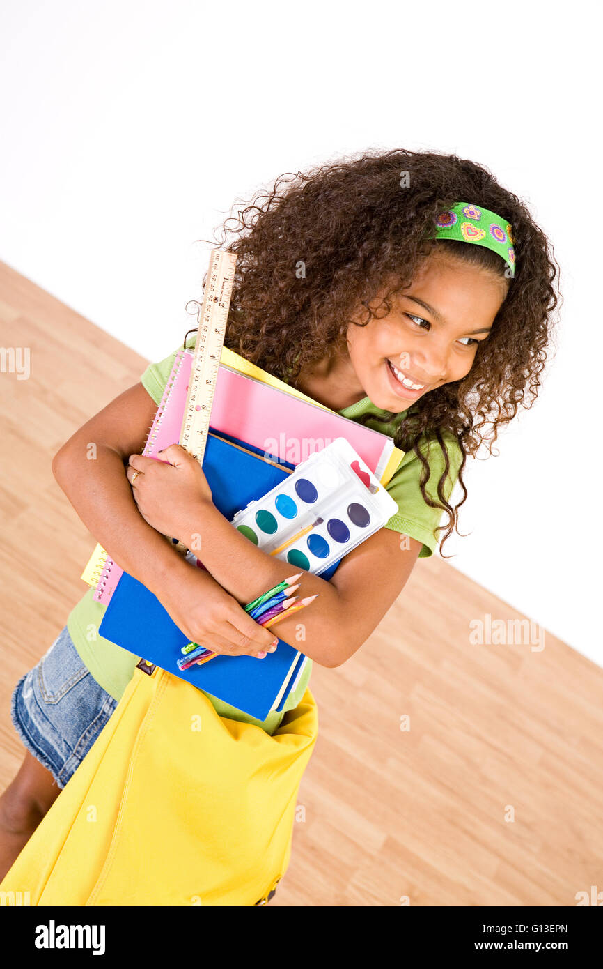 Series of African American boy and girl students, wearing backpacks ...