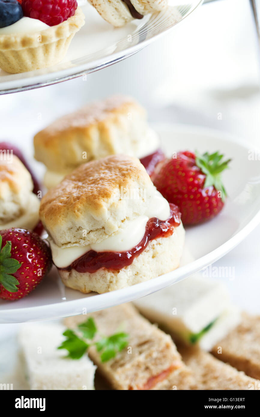 Afternoon tea served on a tiered cake stand Stock Photo - Alamy
