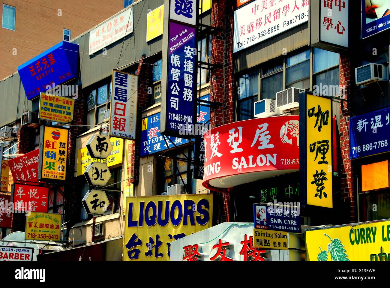 New York City : A plethora of store signs in both English and Chinese ...