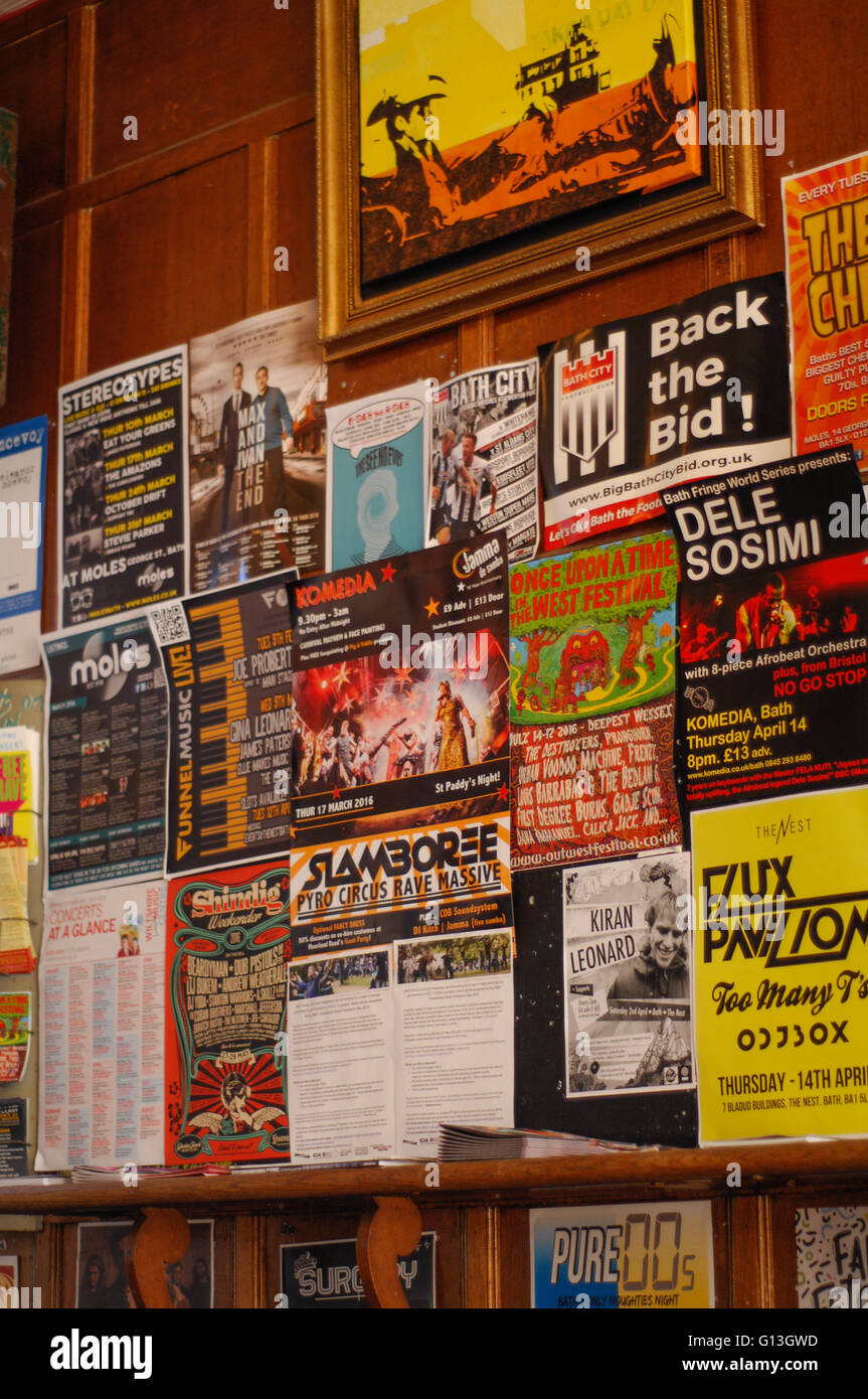 Posters in a pub in Bath Somerset Stock Photo - Alamy