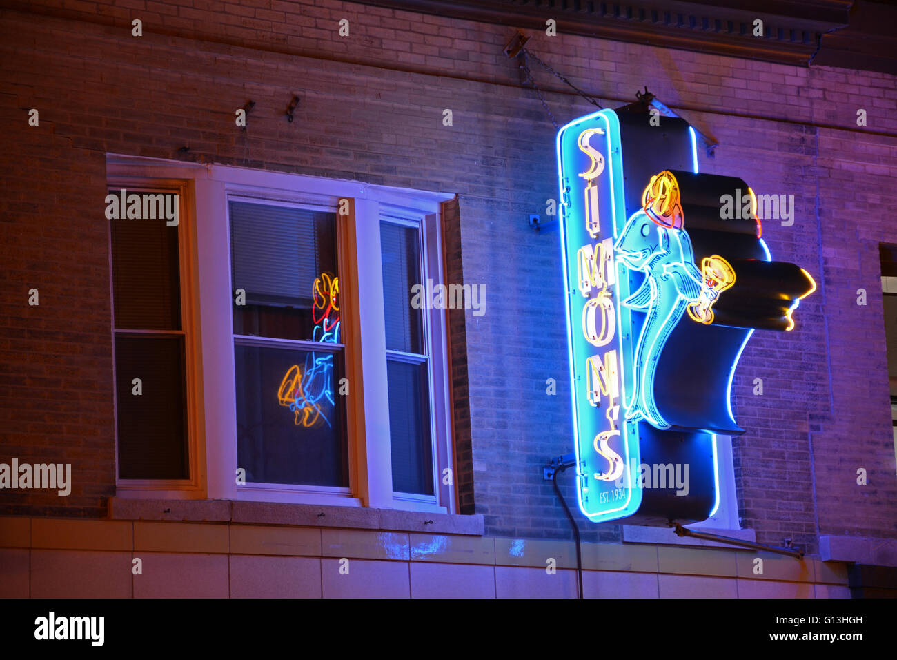 The 1934 neon sign with viking fish logo for Simon's pub in the north ...