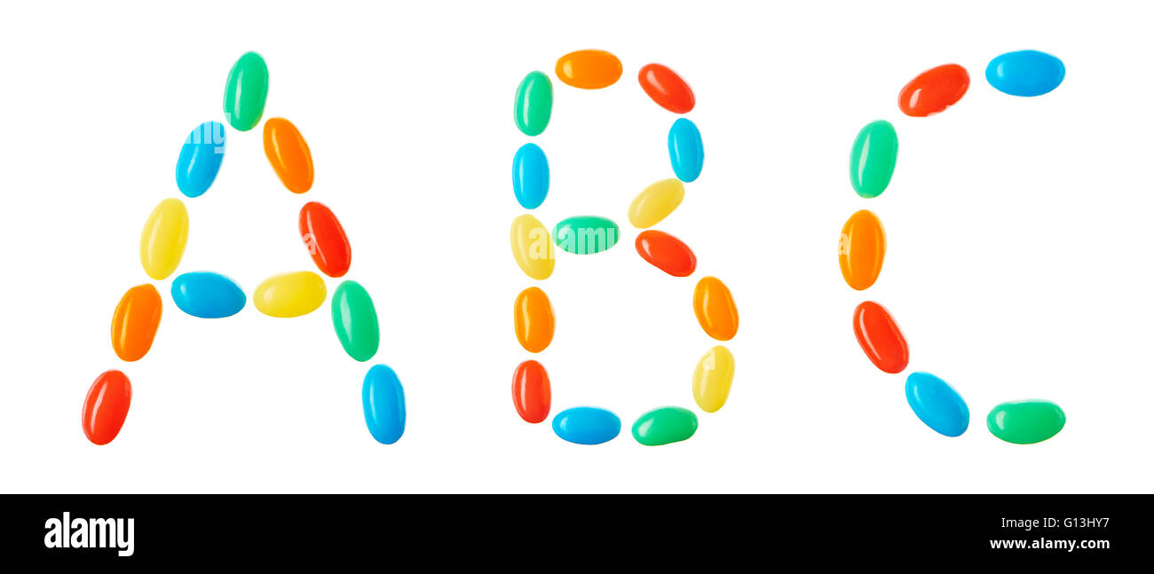 ABC lettering made of multicolored candies isolated on white background ...