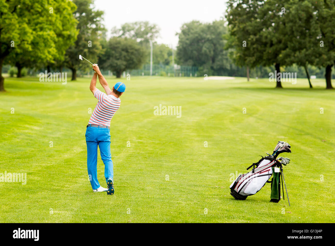 Exercise playing golf hi-res stock photography and images - Alamy