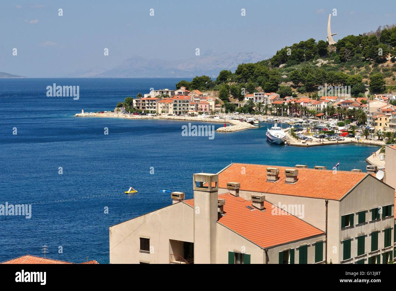 Birdview of Podgora with port and monument Seagull's wings. Croatia ...