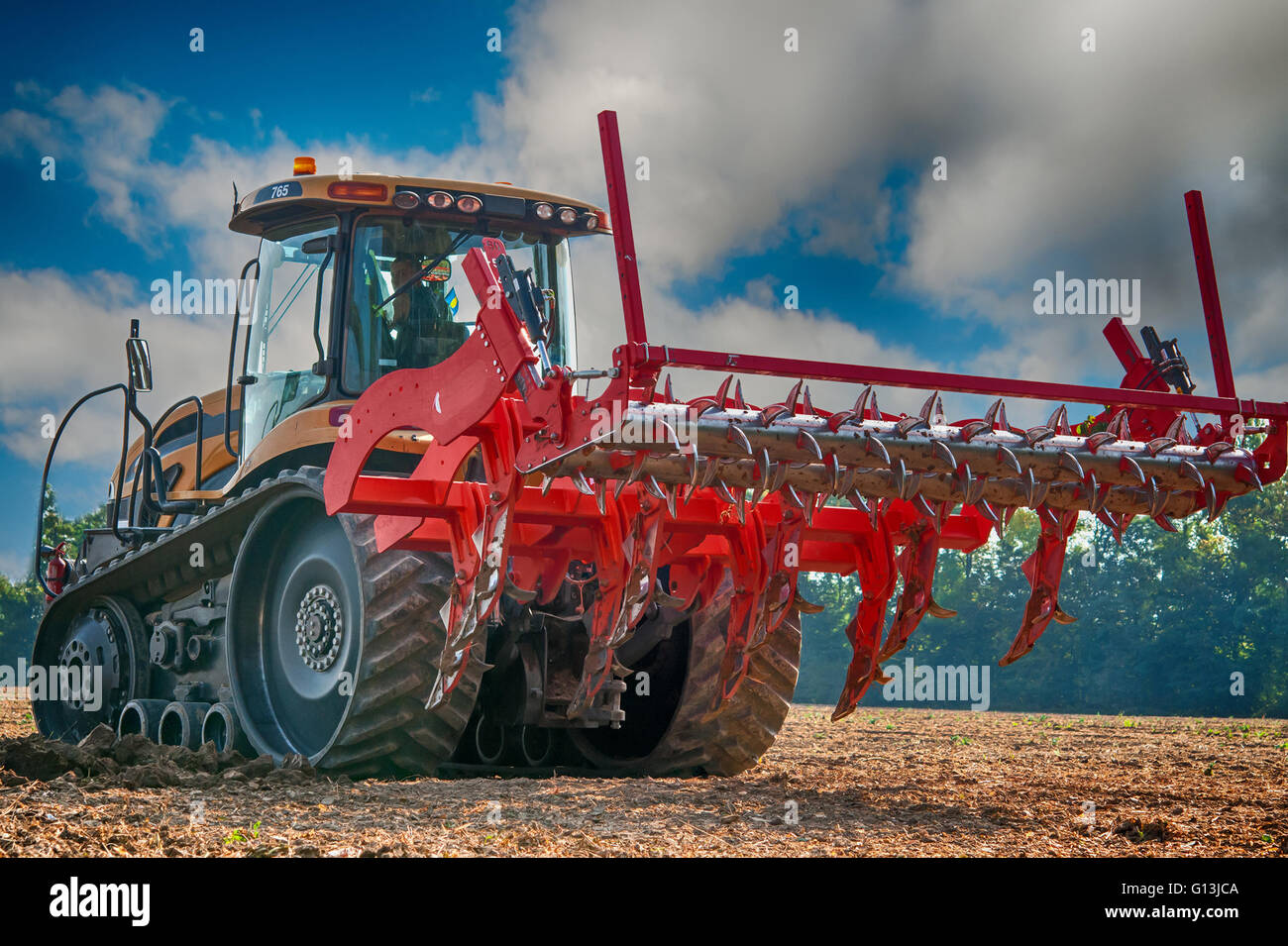 Yellow tractor spring hi-res stock photography and images - Alamy