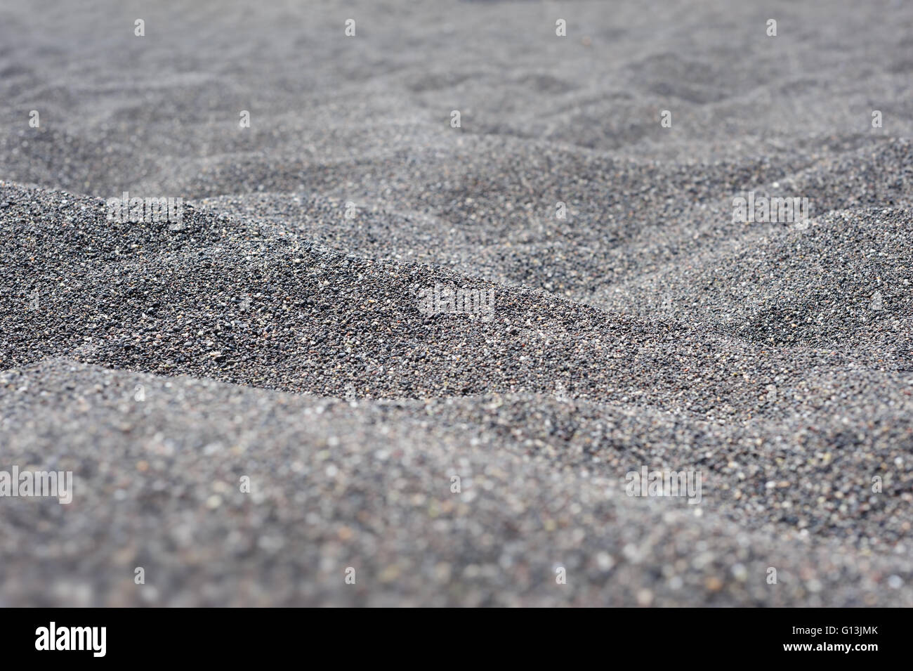 Black volcanic sand Stock Photo - Alamy