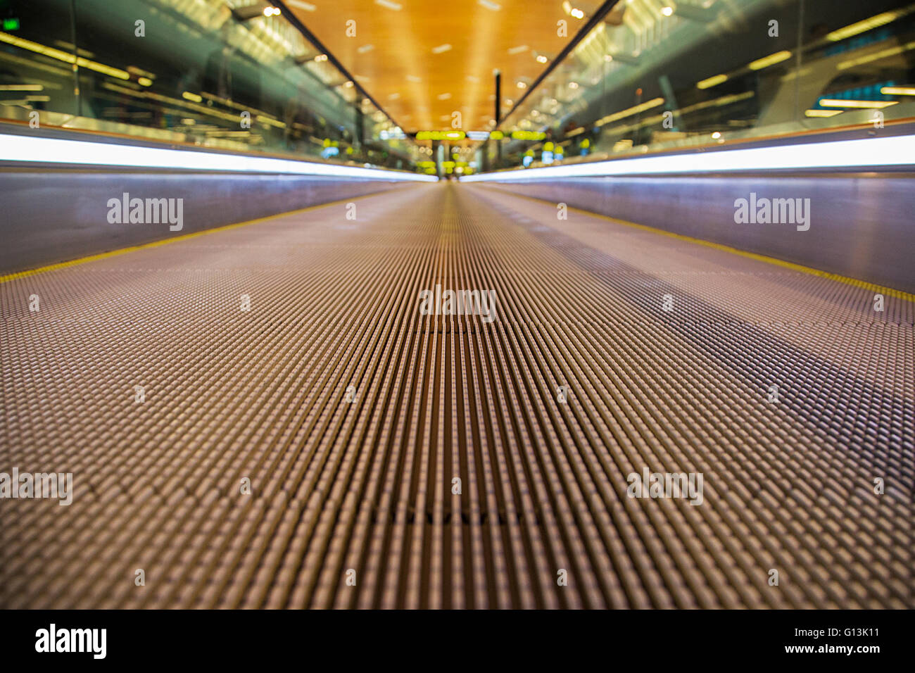 Close view of the moving walkway inside Stock Photo - Alamy
