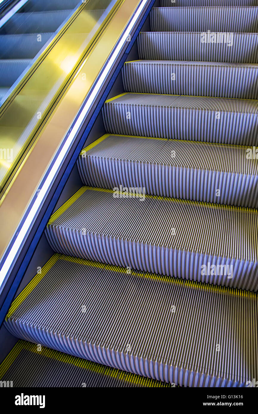 Close view of the staircase of an escalator Stock Photo - Alamy