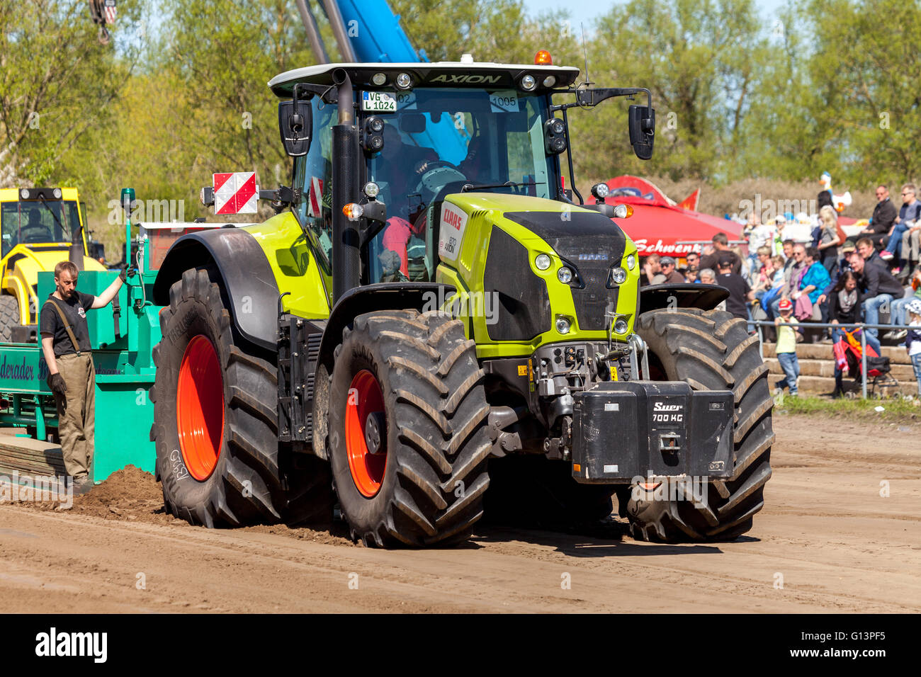 GRIMMEN/ GERMANY - MAY 5: german claas axion tractor drives on track by ...