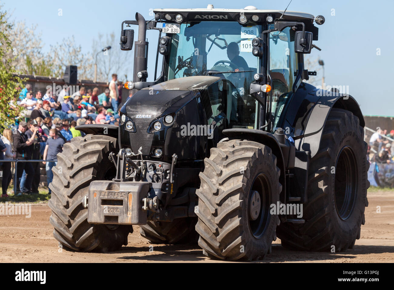 GRIMMEN/ GERMANY - MAY 5: german claas axion tractor drives on track by ...