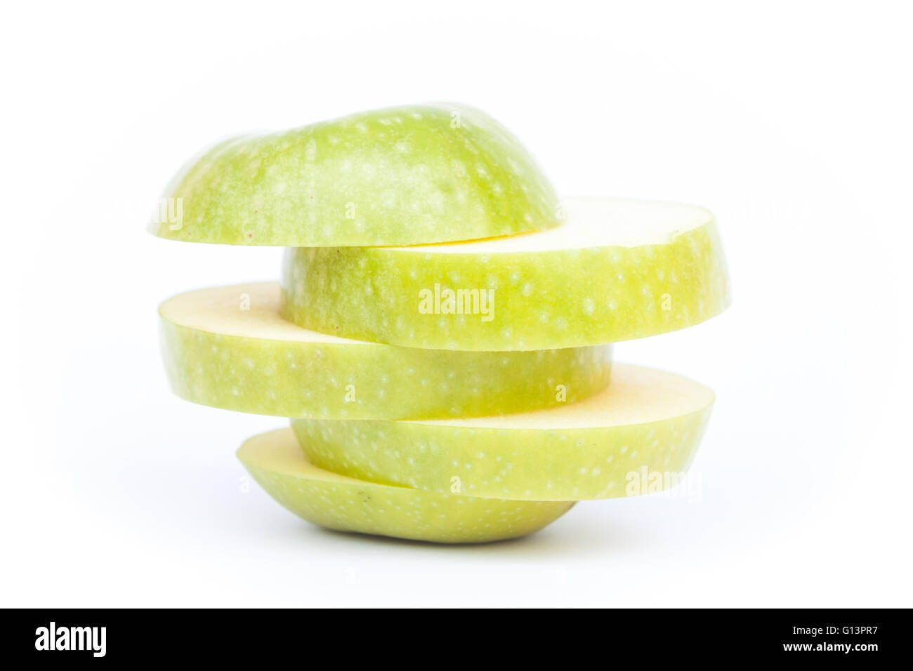 Sliced green apple on white background, stock photo Stock Photo - Alamy