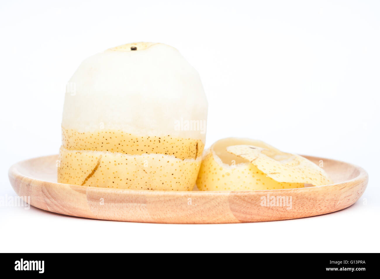 Peeled Chinese pear on white background, stock photo Stock Photo - Alamy