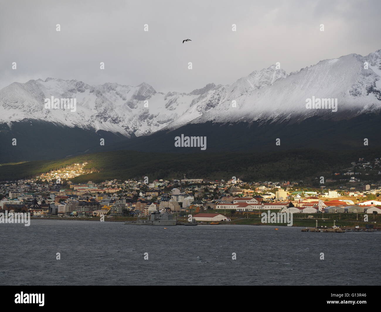 Early morning summer sun rising on Ushuaia and the Beagle Channel ...