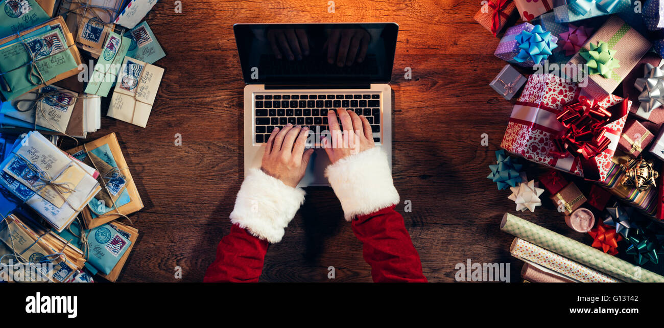 Typing santa claus hi-res stock photography and images - Alamy