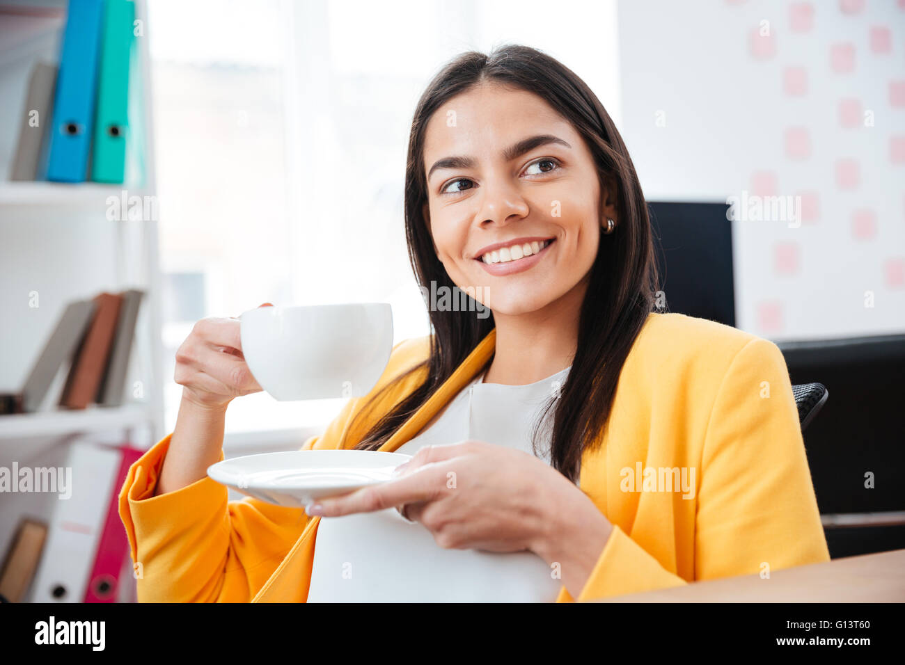 Lady drinking tea with office hi-res stock photography and images - Alamy