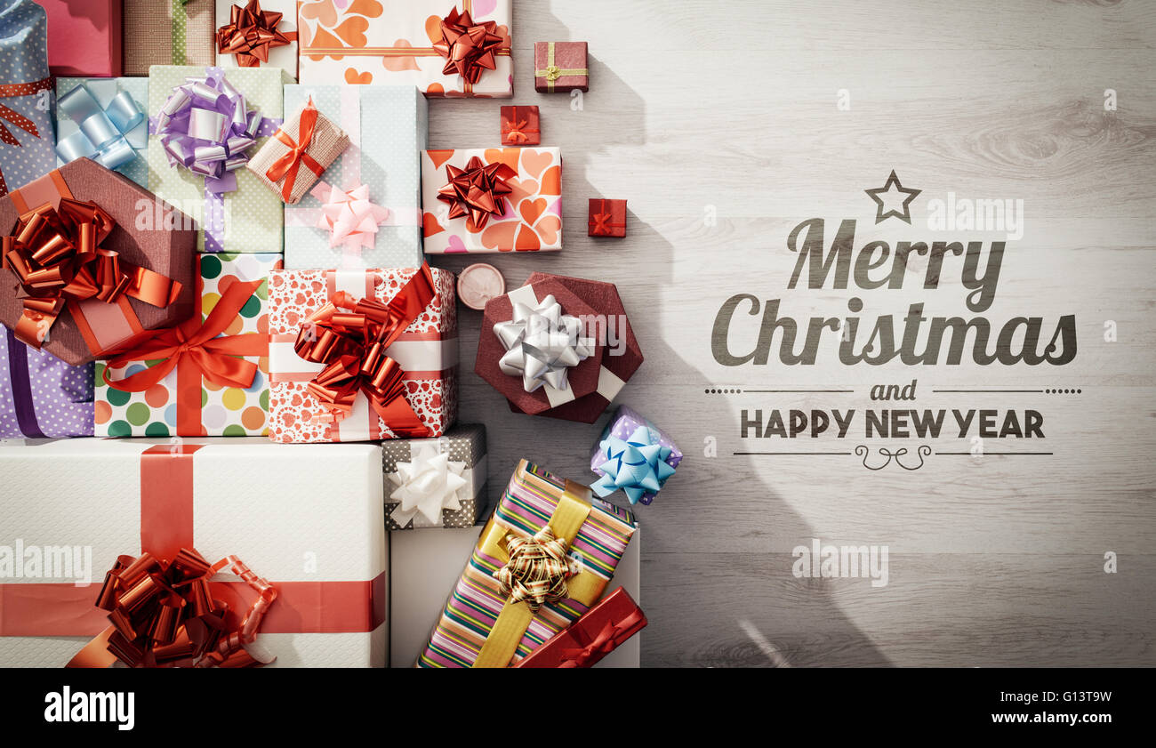 Lots of colorful gifts on a wooden table top view, celebration and ...