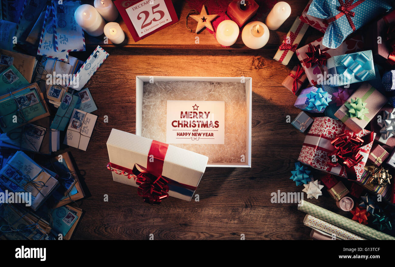 Open gift box with a Merry Christmas and Happy New Year message ...