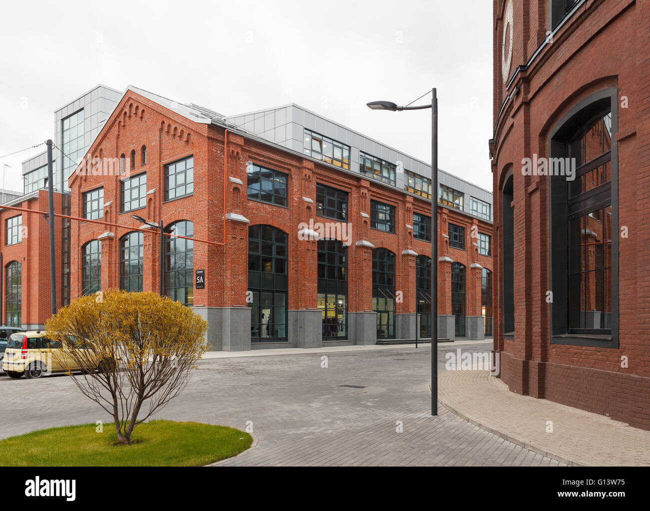 Extensive office complex exterior in loft style. Red brick buildings of ...