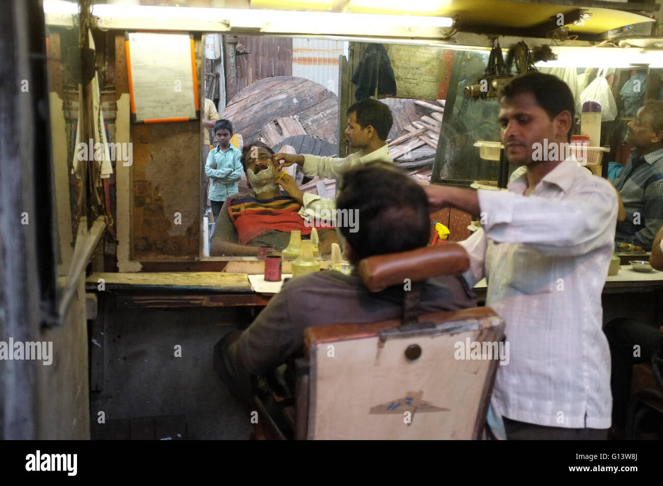 hair cutting barber shop in a slum area of kurla, mumbai, india Stock ...