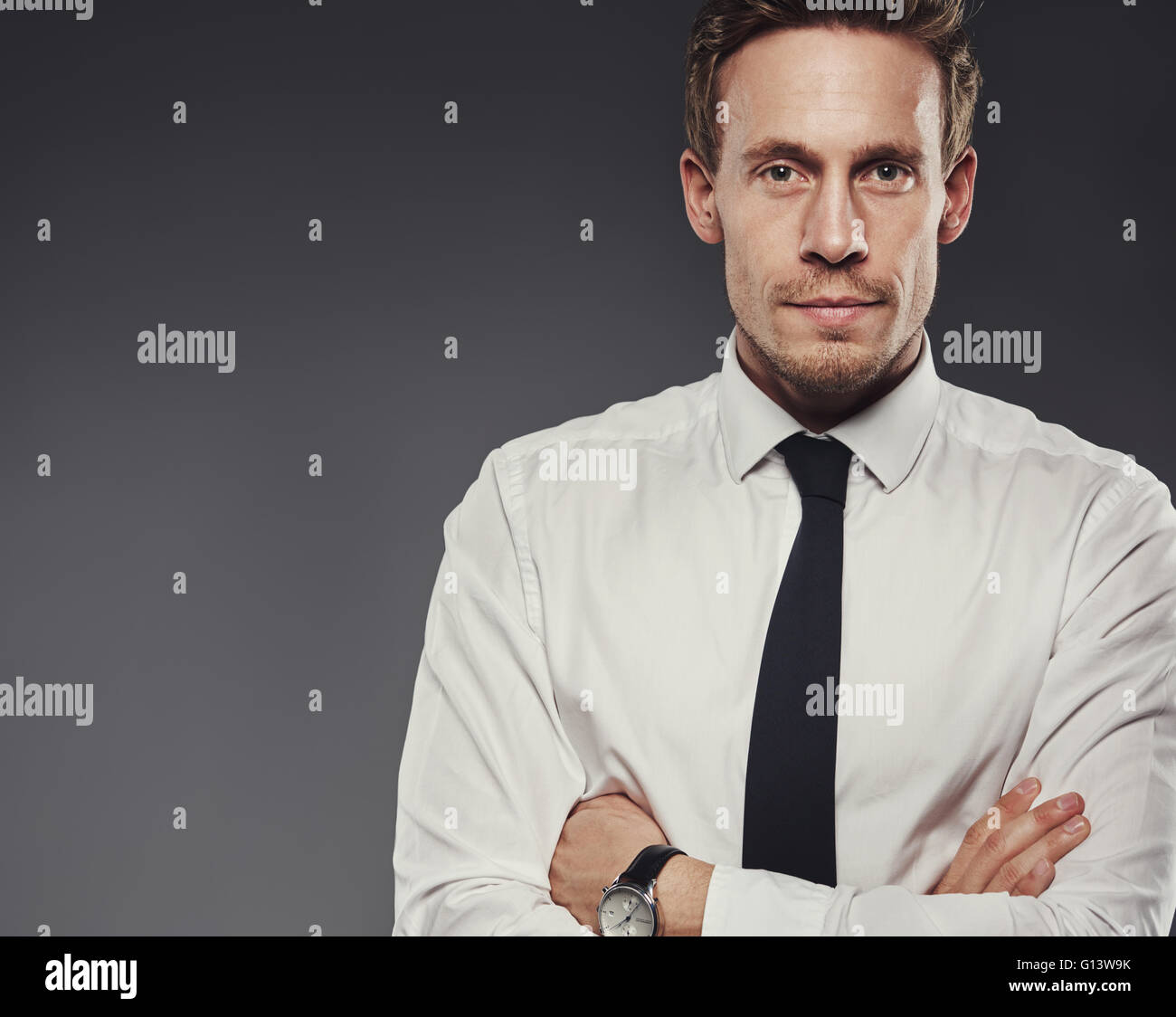 Stern man arms crossed hi-res stock photography and images - Alamy