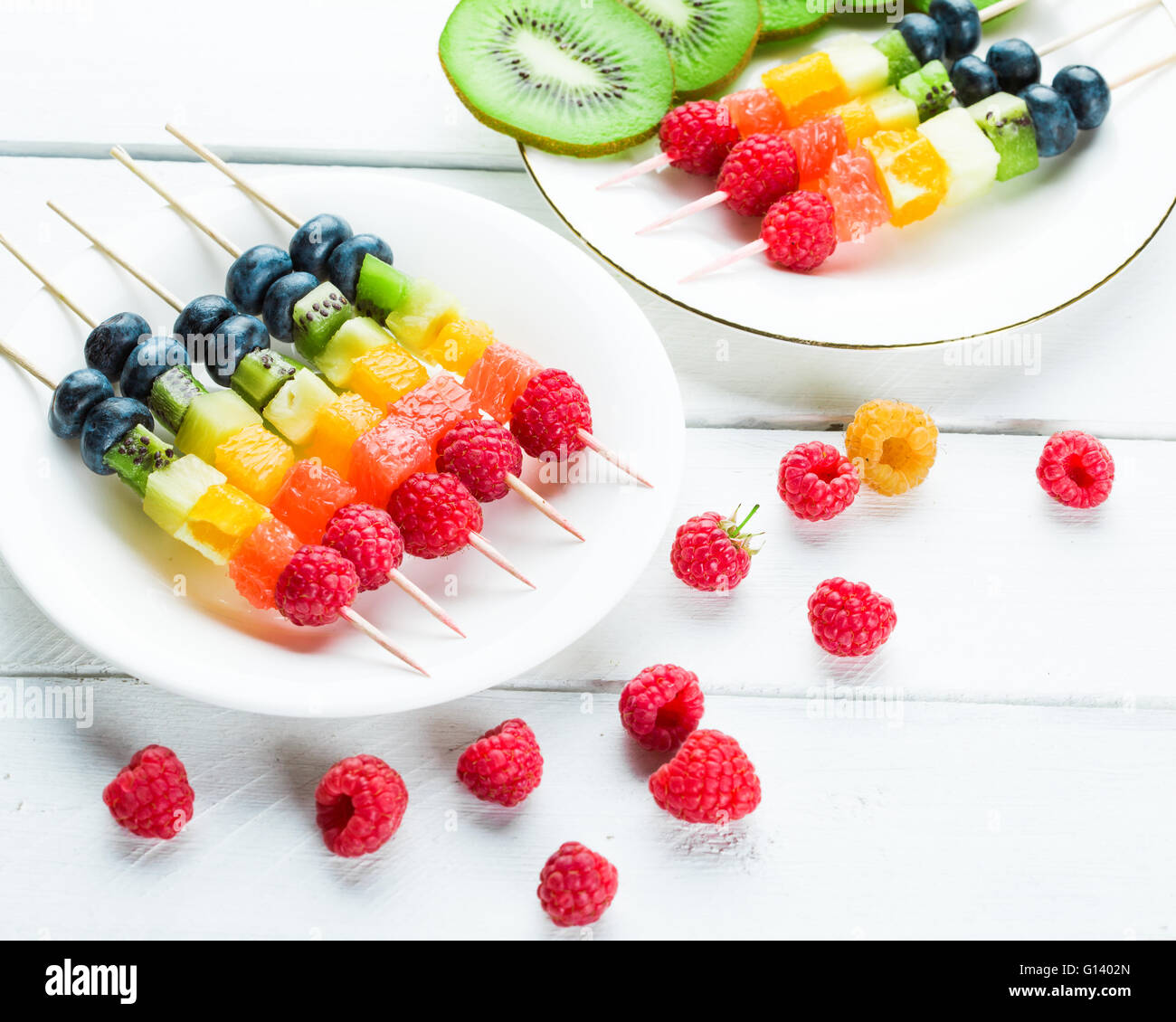 Fresh summer fruits on sticks Stock Photo - Alamy