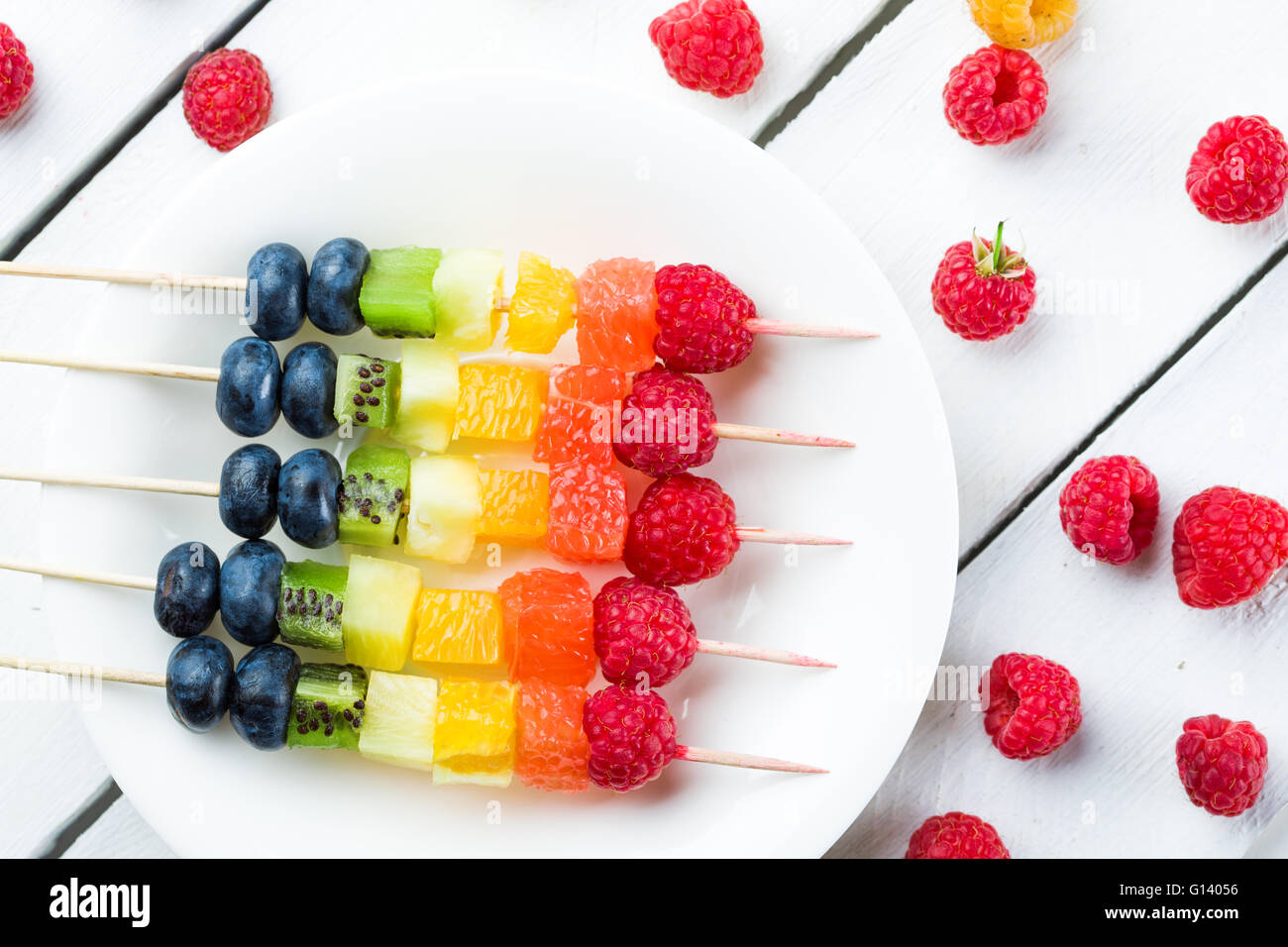 Fresh summer fruits on sticks Stock Photo - Alamy