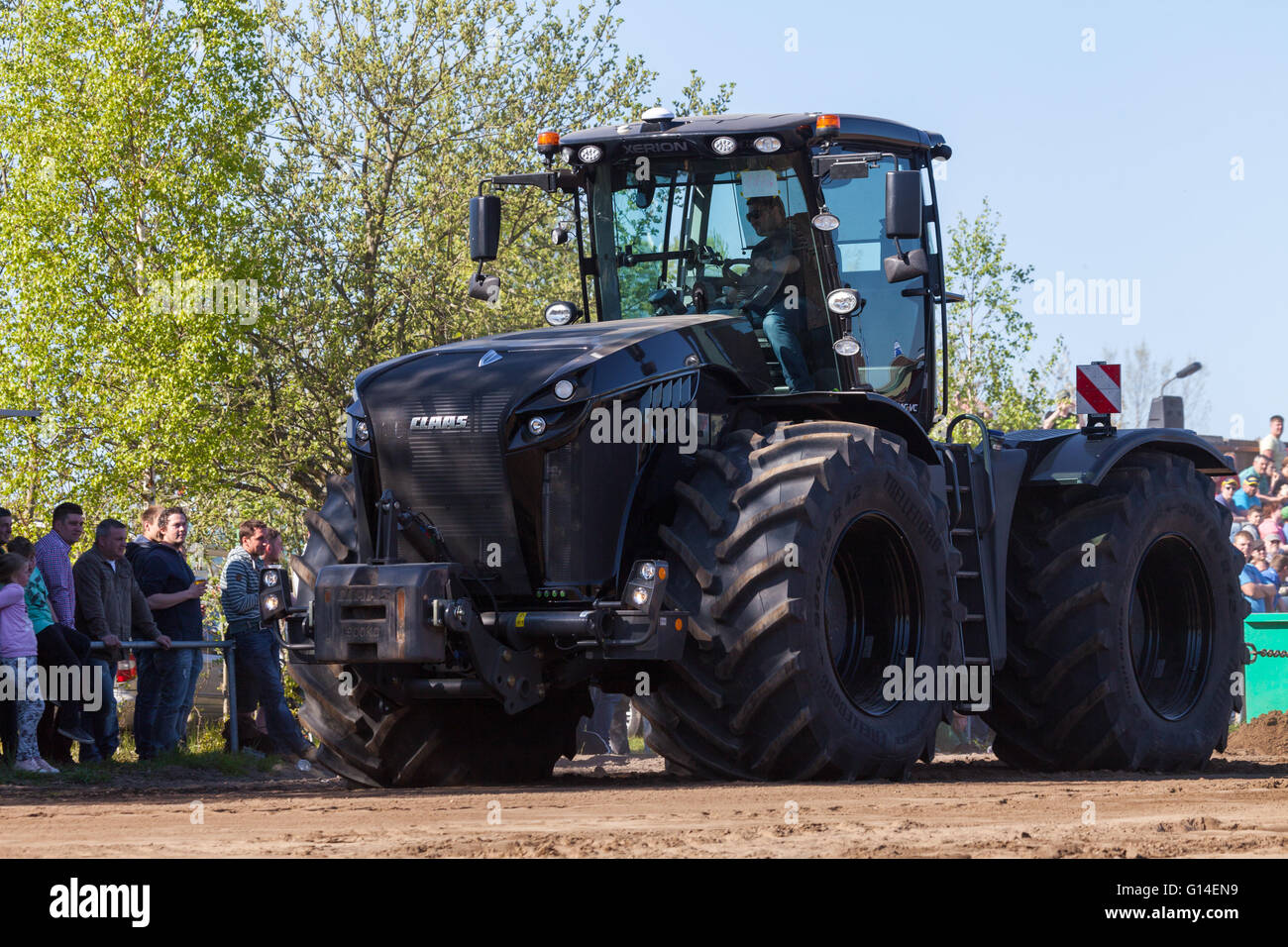 german claas xerion tractor drives on track on a motortechnic festival ...