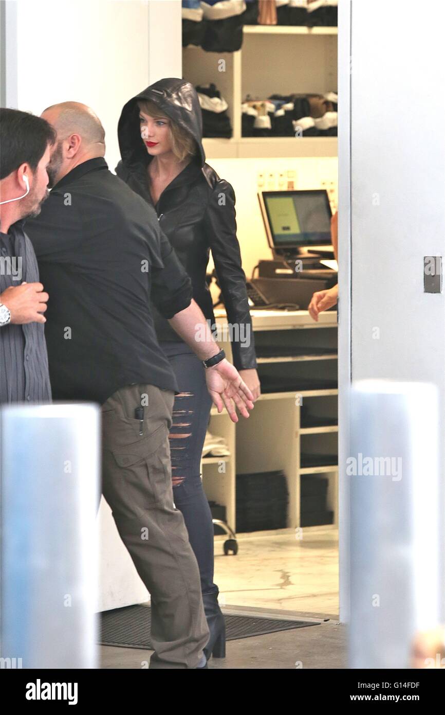 Taylor Swift seen leaving from the back door of a store on Rodeo Drive ...