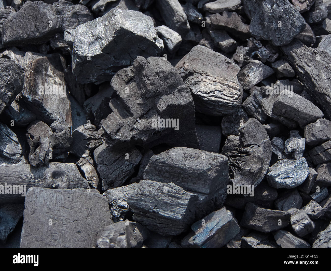 A close up of lump charcoal Stock Photo - Alamy