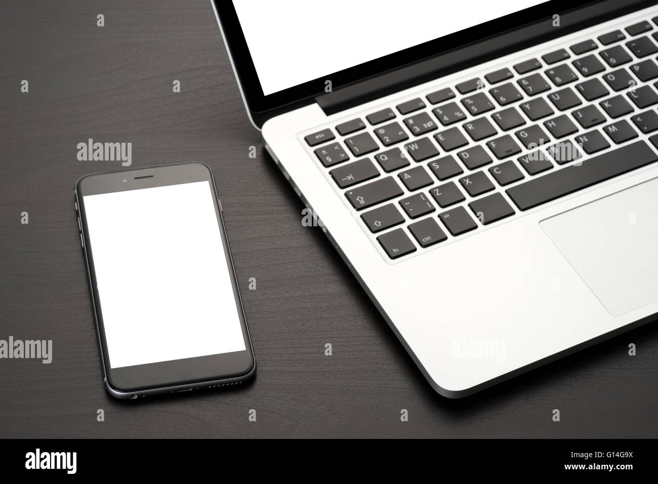 Laptop and smartphone Stock Photo - Alamy