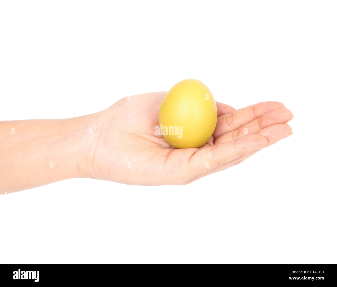 yellow easter egg in hand on white background Stock Photo - Alamy