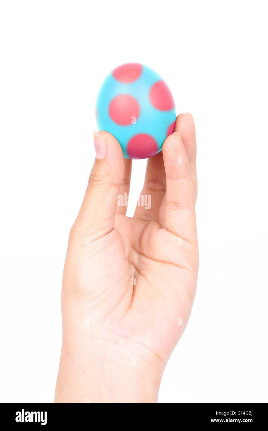 easter egg in hand on white background Stock Photo - Alamy