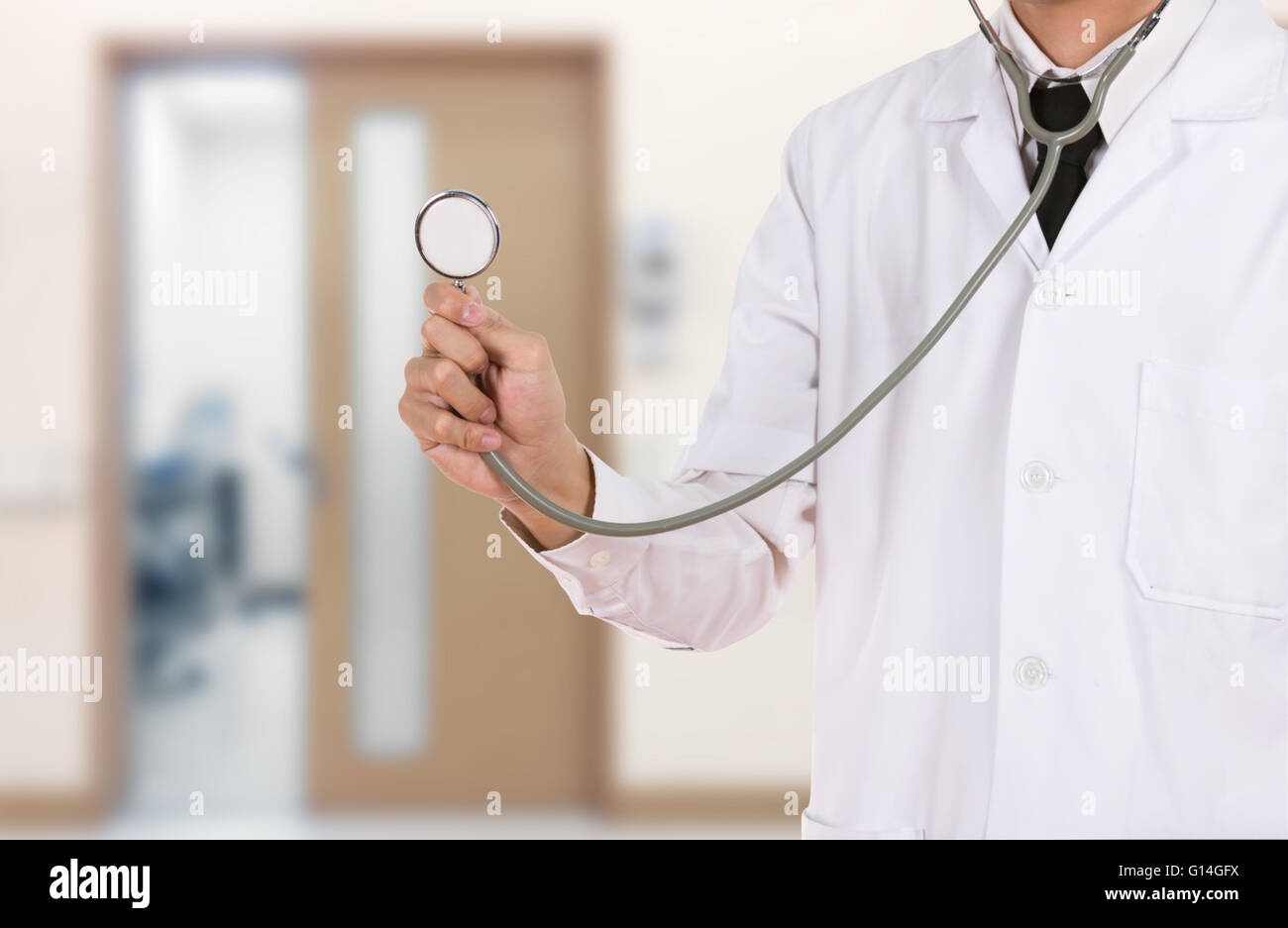 doctor with stethoscope in hospital background Stock Photo - Alamy