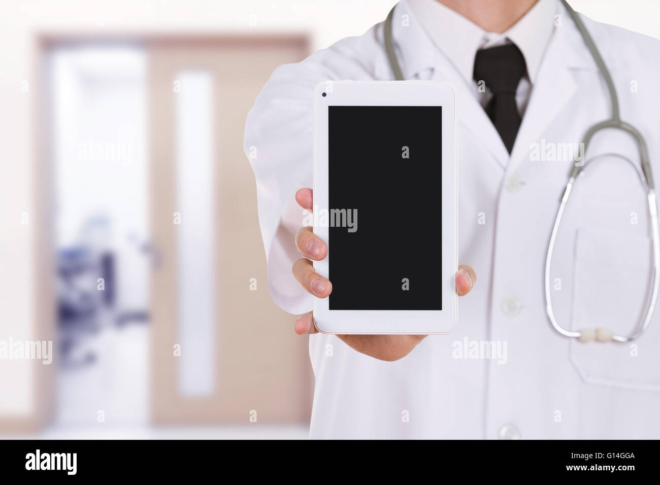 close-up doctor showing tablet computer blank screen in hospital Stock ...