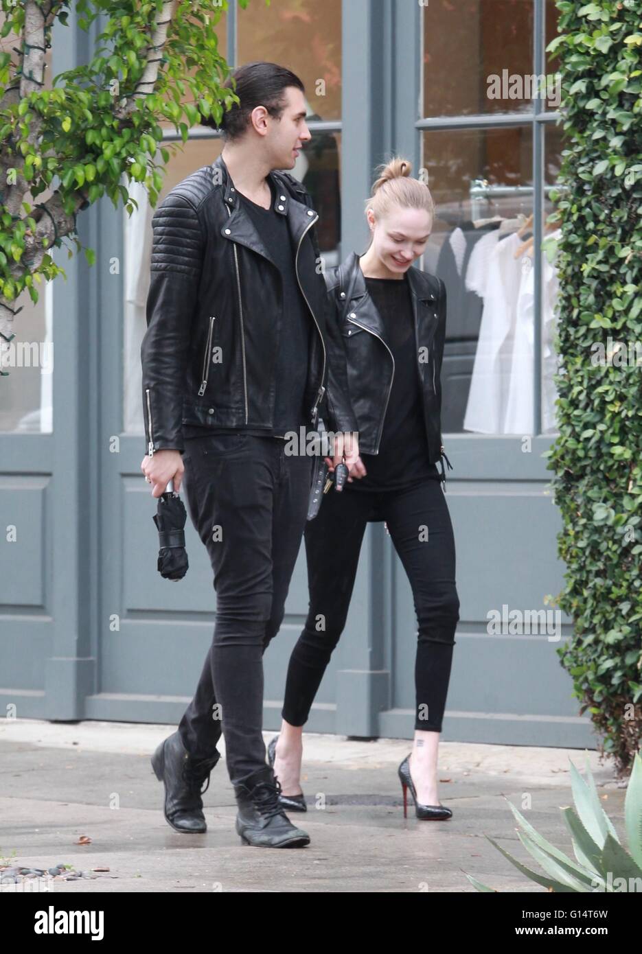 Nick Simmons and a female companion arriving at Alfred Coffee Featuring ...