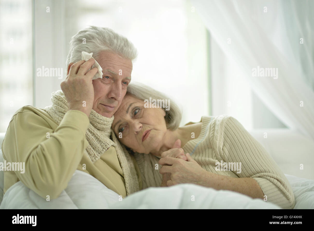 Sick older woman laying in bed hi-res stock photography and images - Alamy