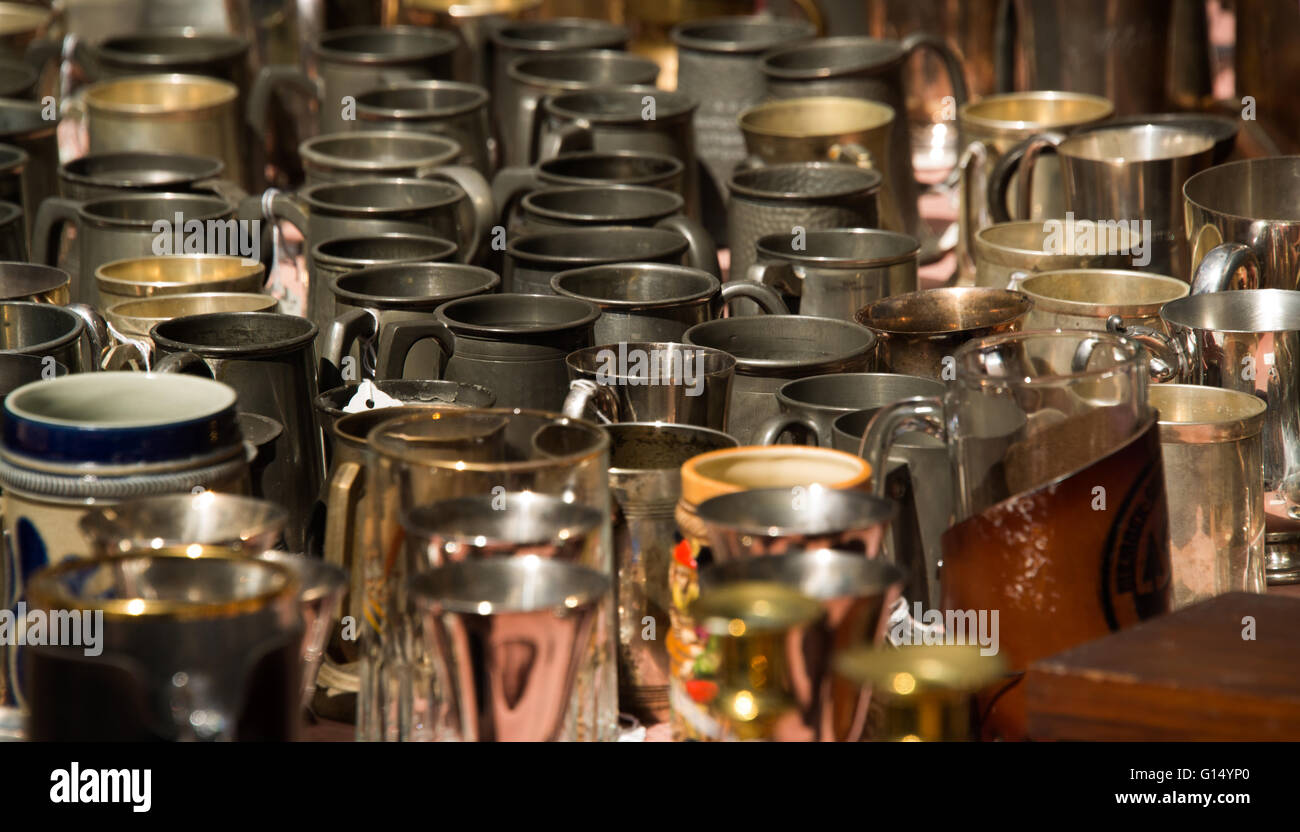 Selection of tankards for sale on a stall Stock Photo - Alamy